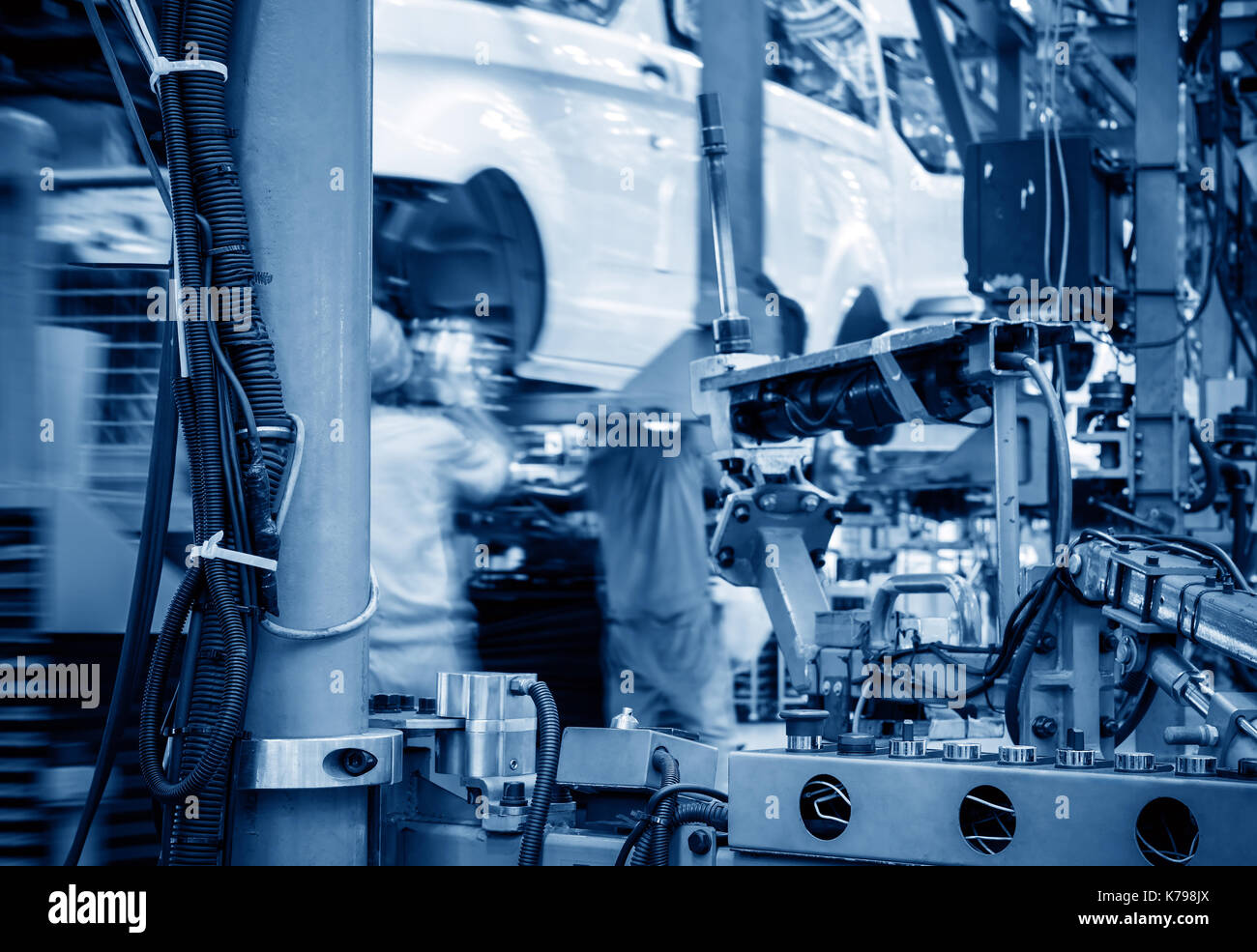 Car production line, skilled workers are working tense Stock Photo - Alamy
