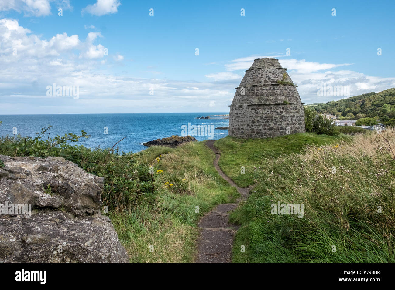 Landscape view of Dunure Scotland looking over the sea with ruins in ...