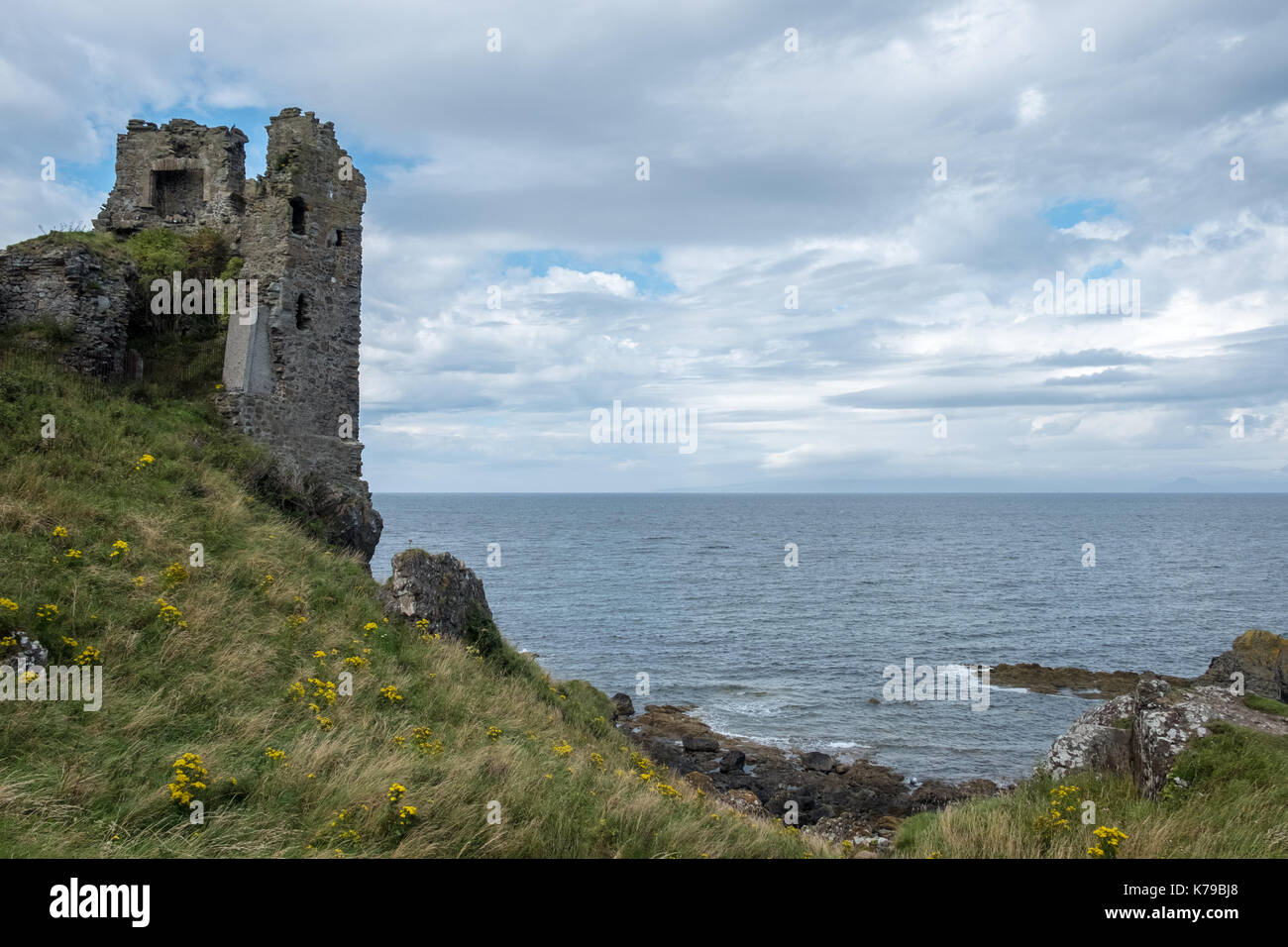 Landscape view of Dunure Scotland looking over the sea with ruins in ...