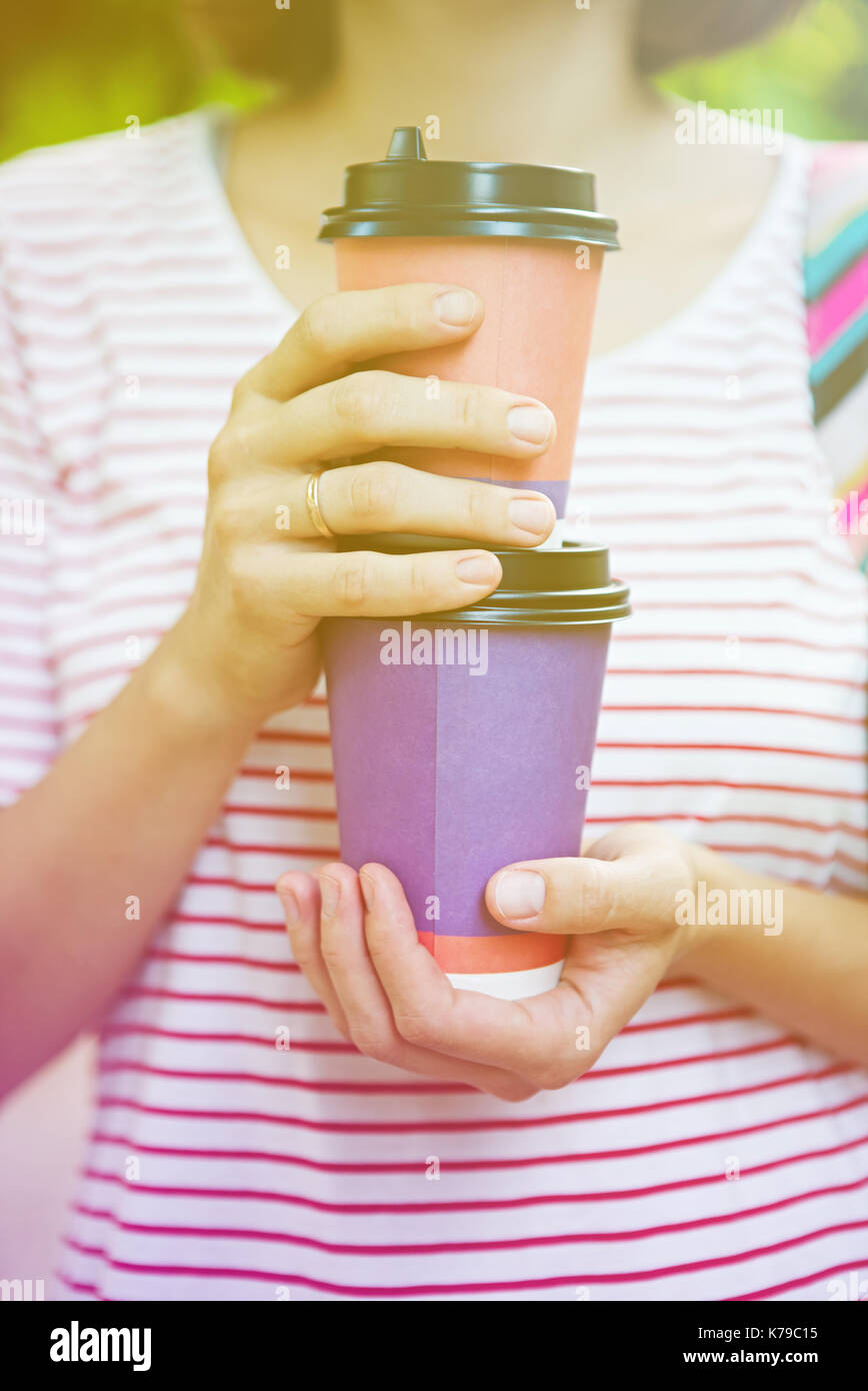 Take-away coffee in his hands Stock Photo - Alamy