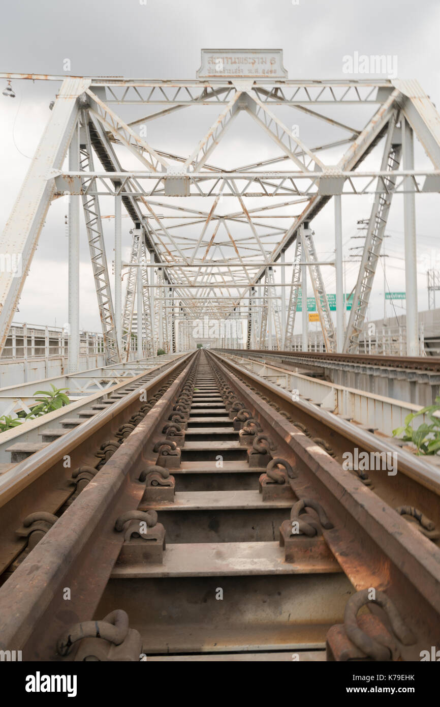 old iron white bridge and railway line Stock Photo - Alamy