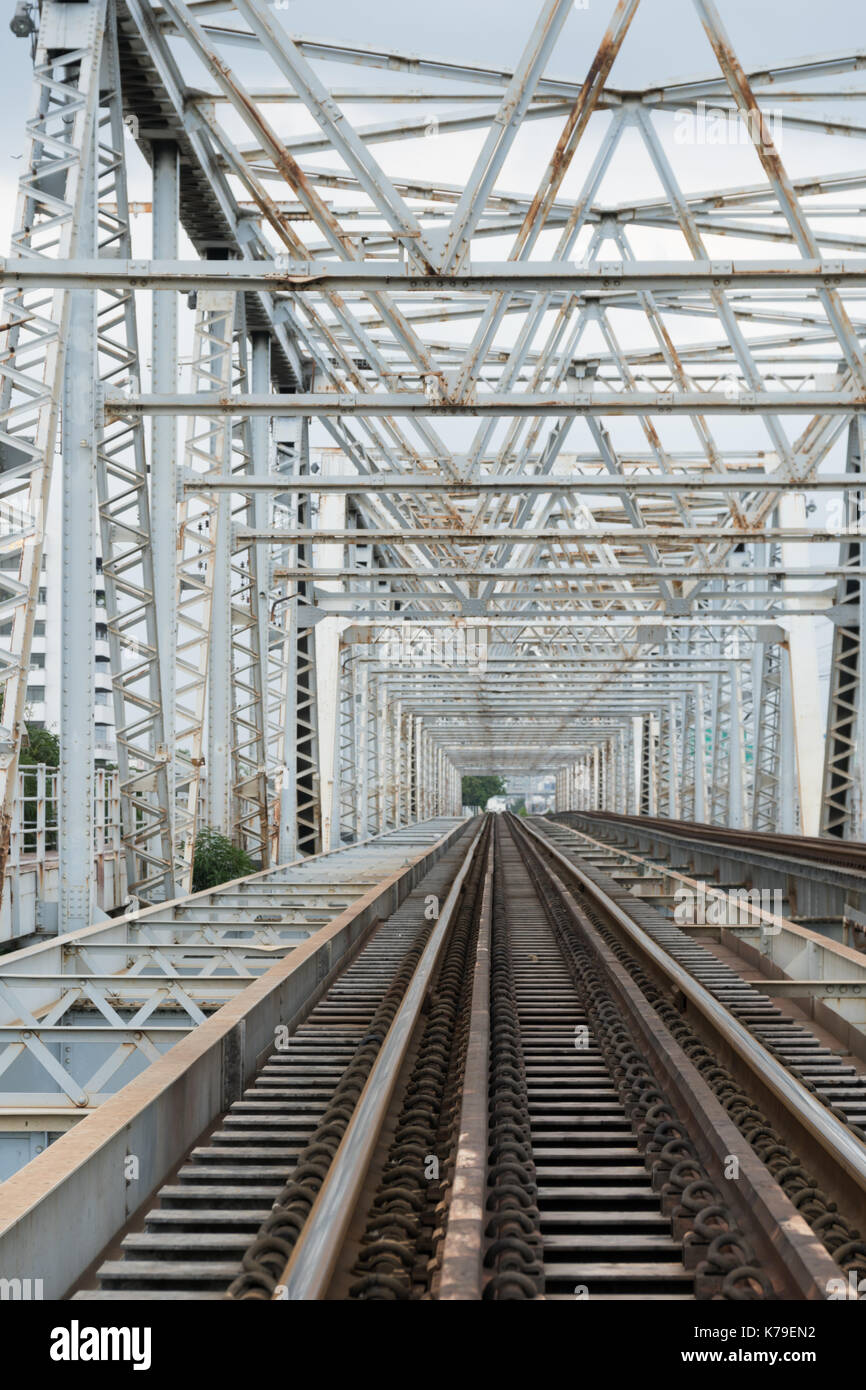 old iron white bridge and railway line Stock Photo - Alamy
