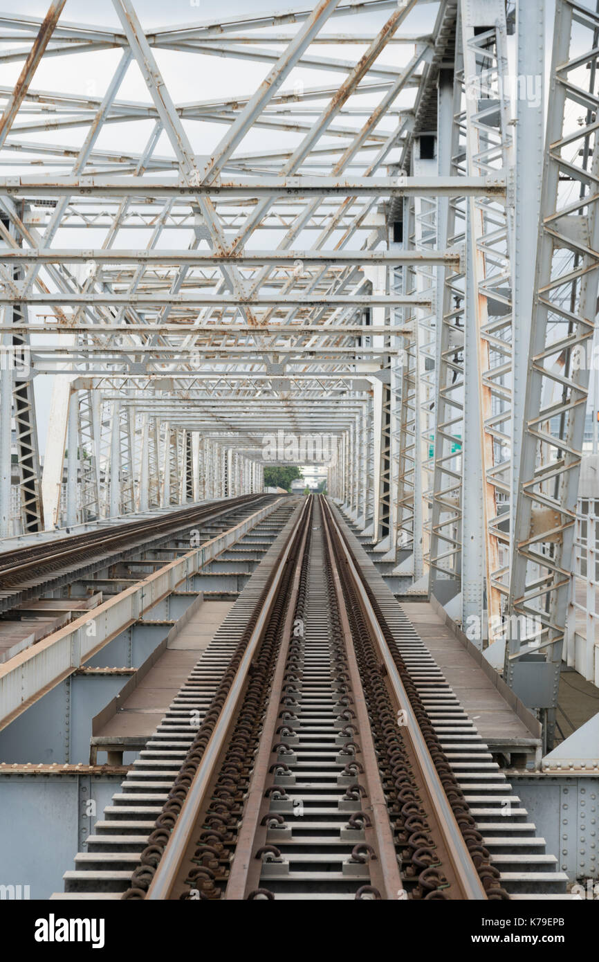 old iron white bridge and railway line Stock Photo - Alamy