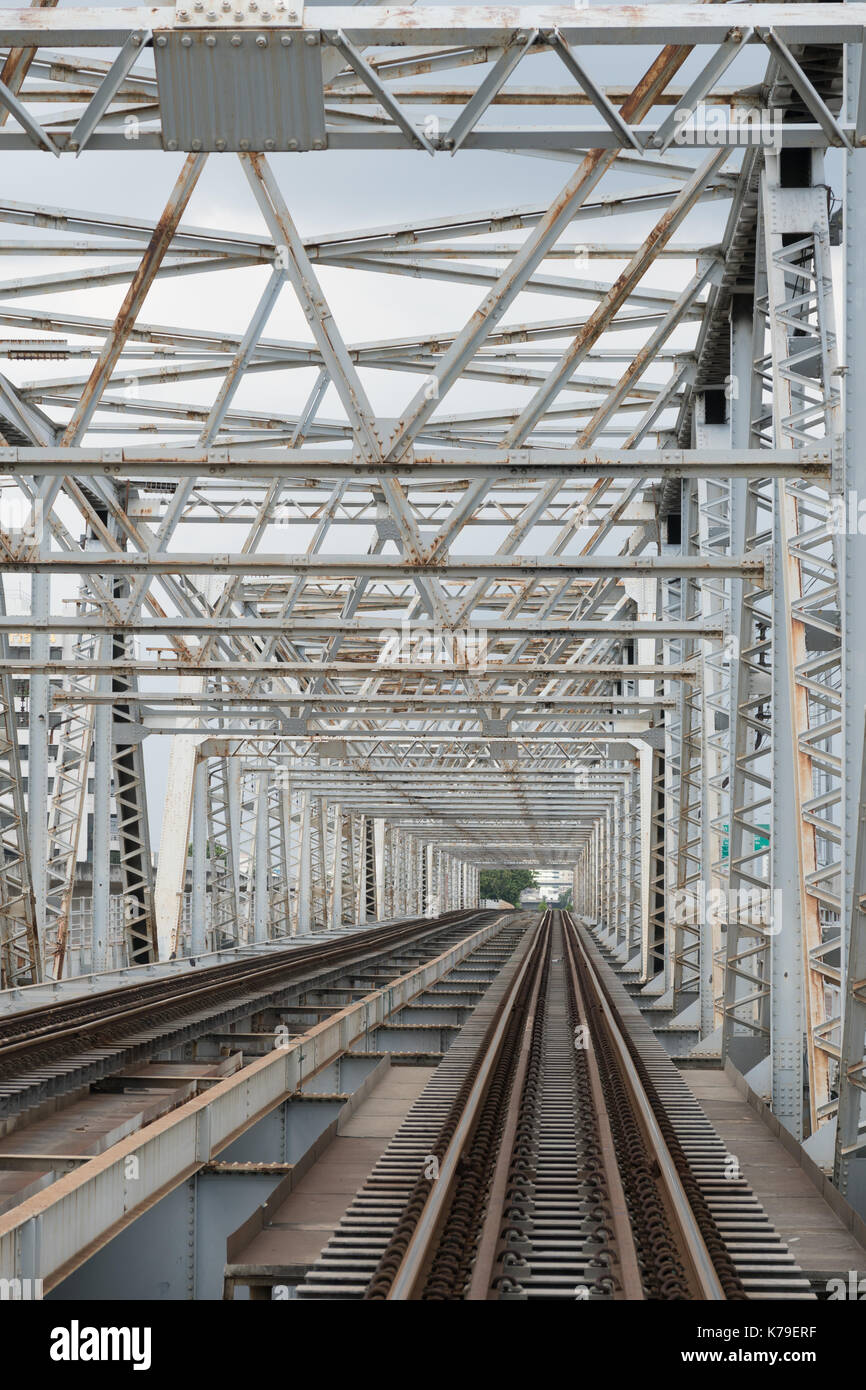 old iron white bridge and railway line Stock Photo - Alamy