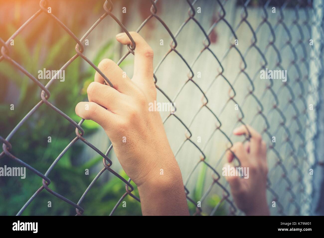 Jail bars child hi-res stock photography and images - Alamy