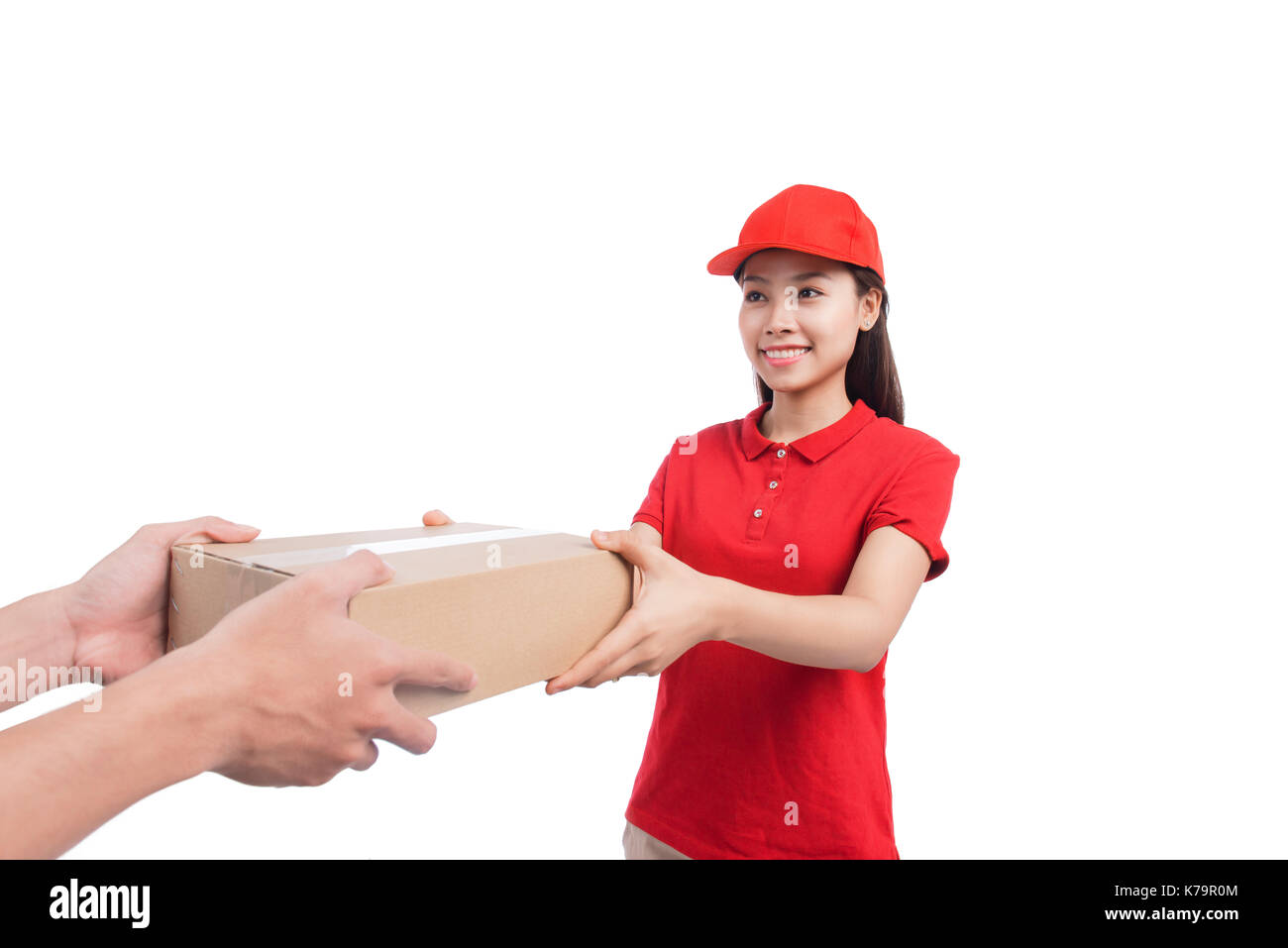 Portrait of delivery woman service happily delivering package to ...
