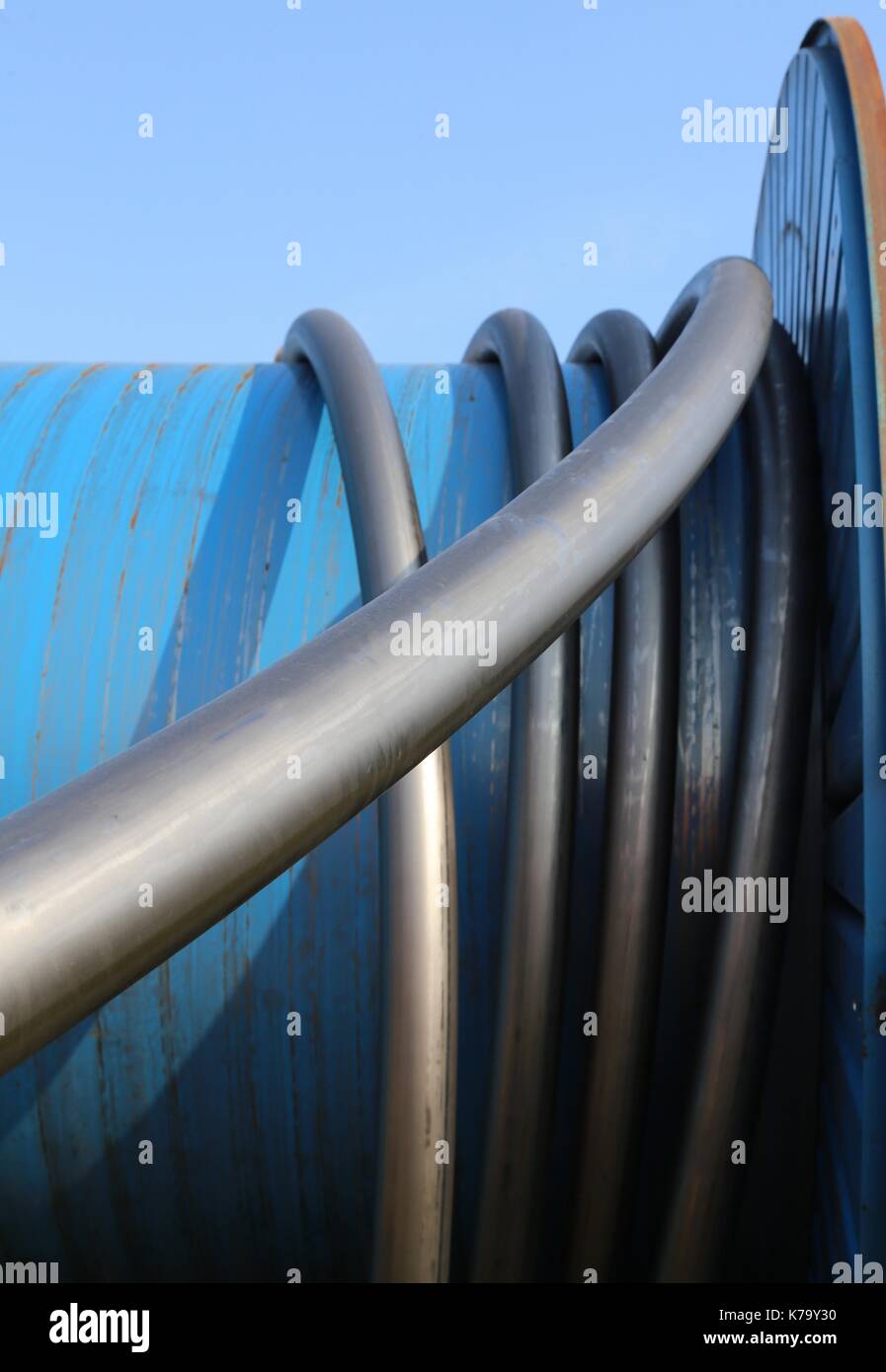 detail with a large high voltage electric cable during laying in the ...