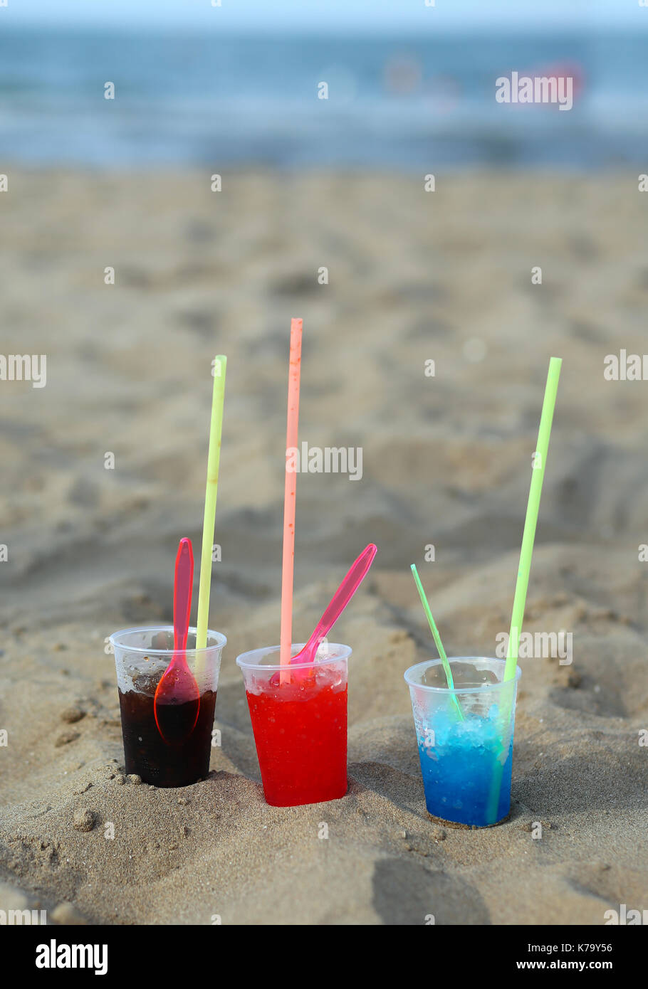 three glasses with frozen syrup on the beach Stock Photo - Alamy