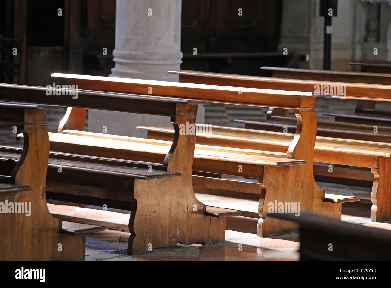 wooden bench with seat inside a church Stock Photo - Alamy