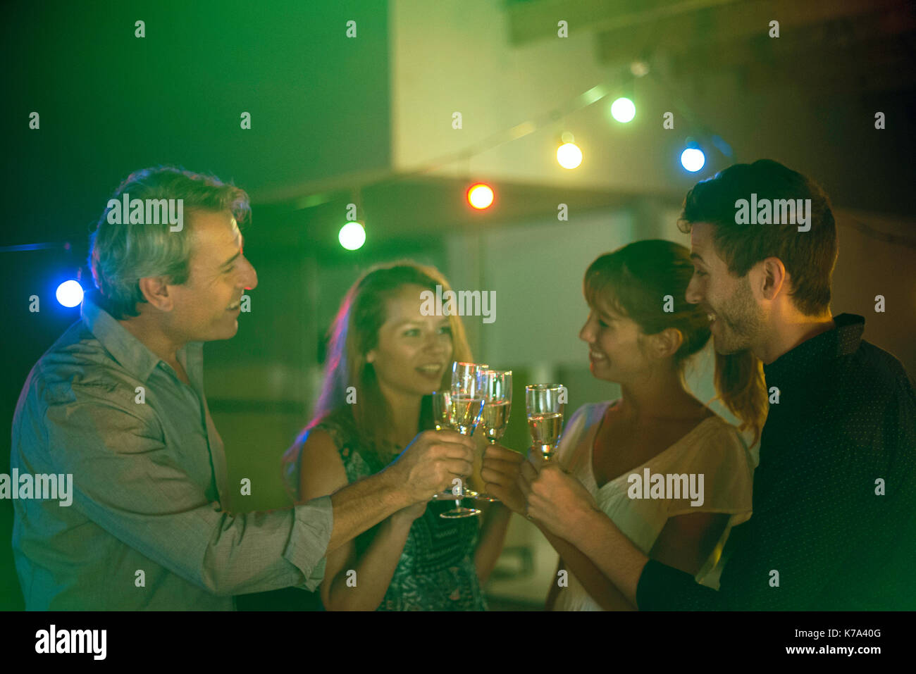 White glasses clinking hi-res stock photography and images - Alamy