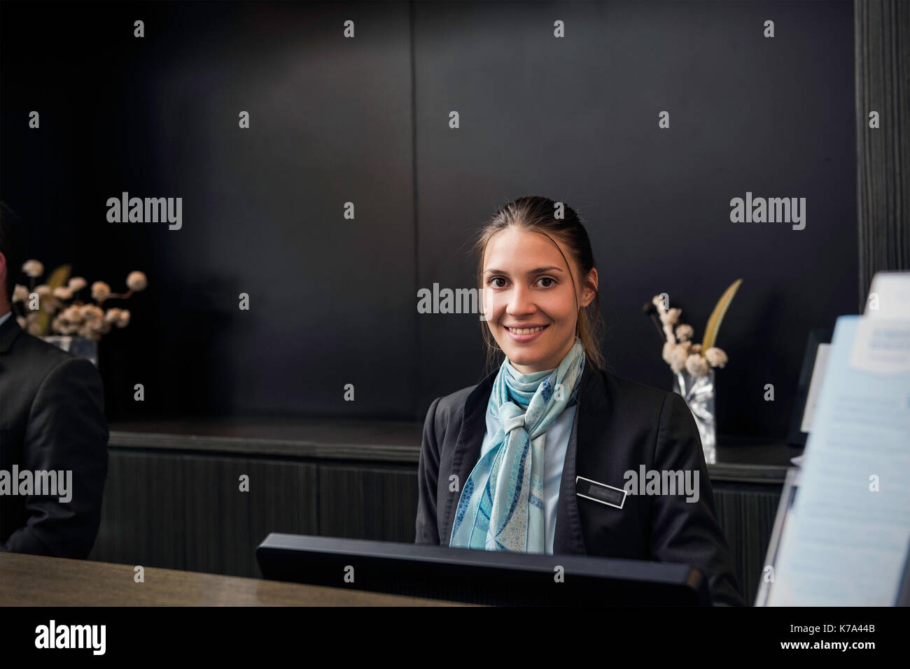 Hotel receptionist, portrait Stock Photo - Alamy