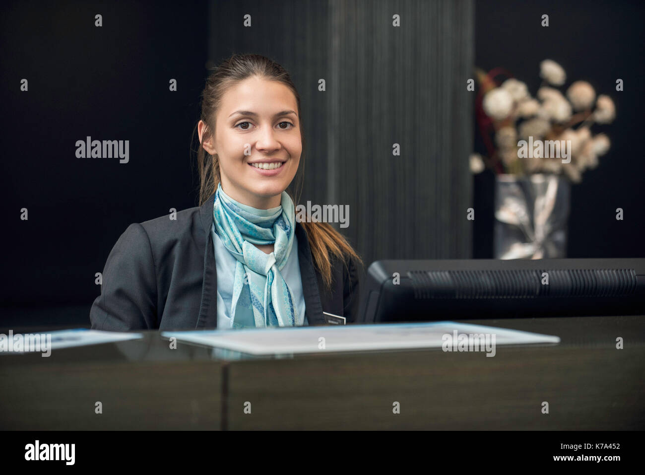 Hotel receptionist, portrait Stock Photo - Alamy