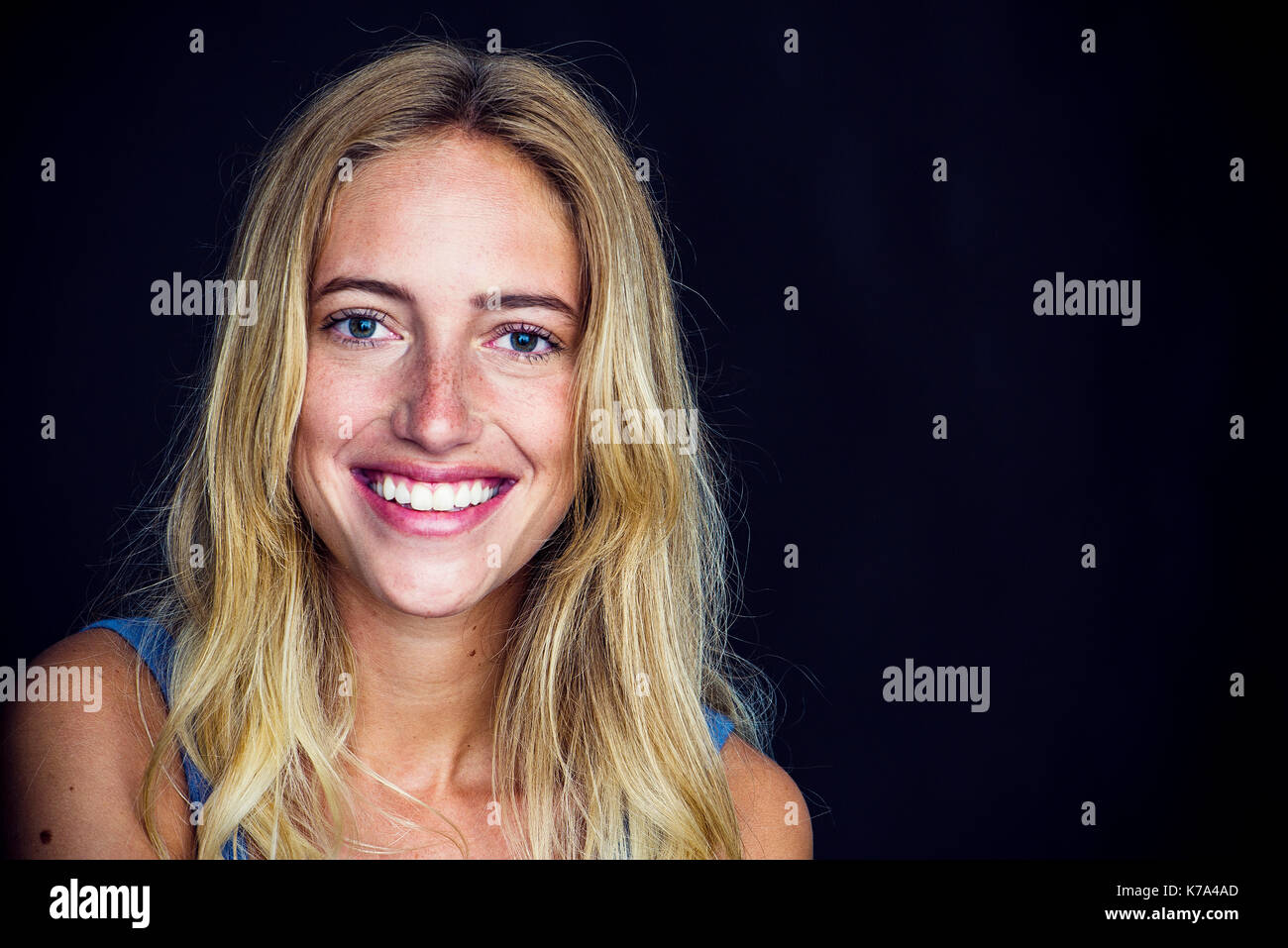 Young woman smiling, portrait Stock Photo - Alamy