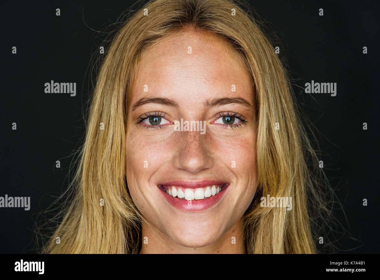 Young smiling dark haired woman hi-res stock photography and images - Alamy