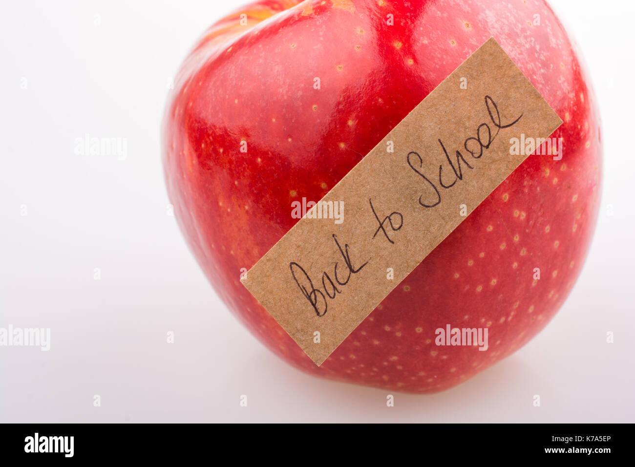 Back to school theme with a red apple Stock Photo - Alamy