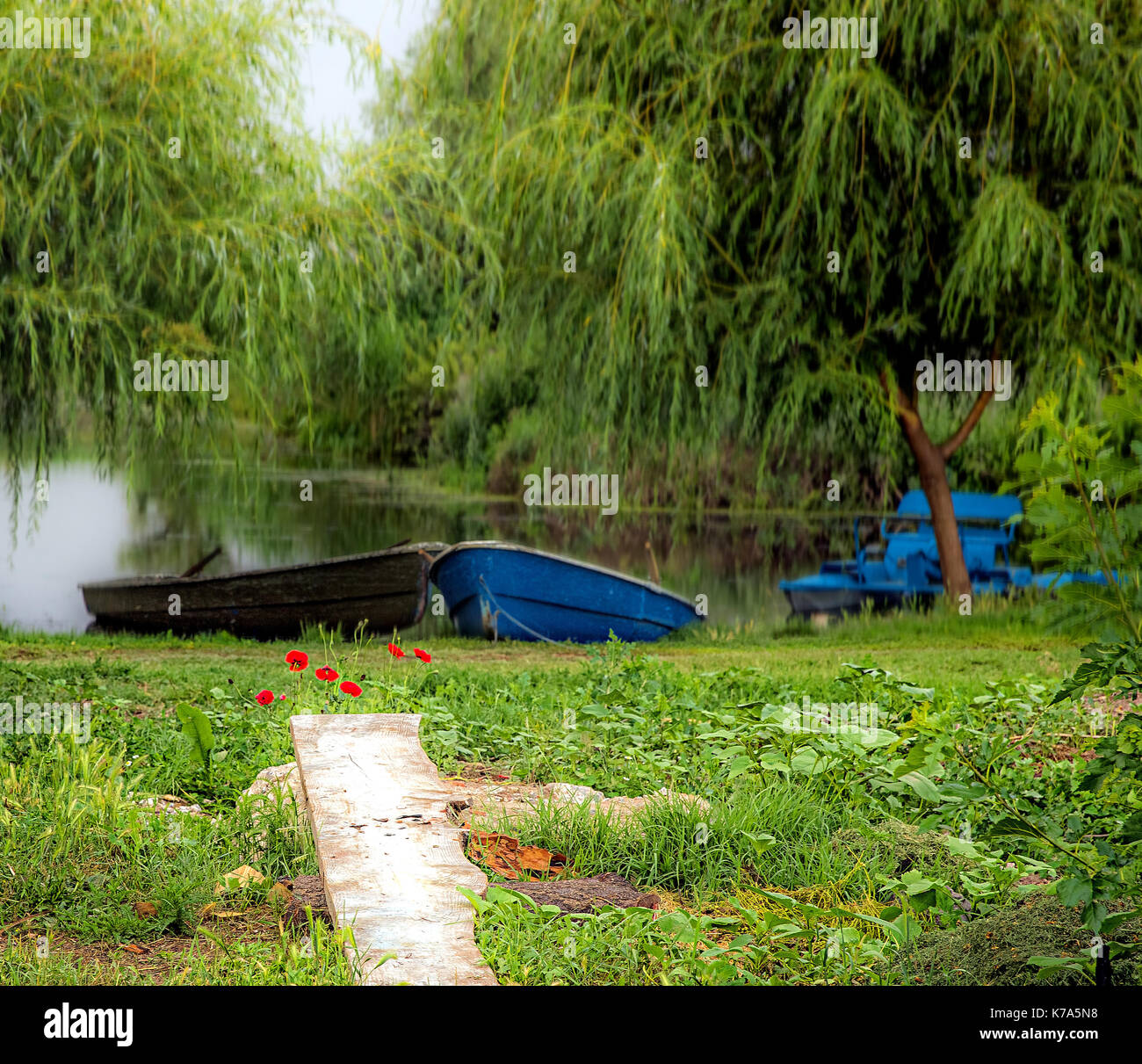 Two blue boats hi-res stock photography and images - Alamy