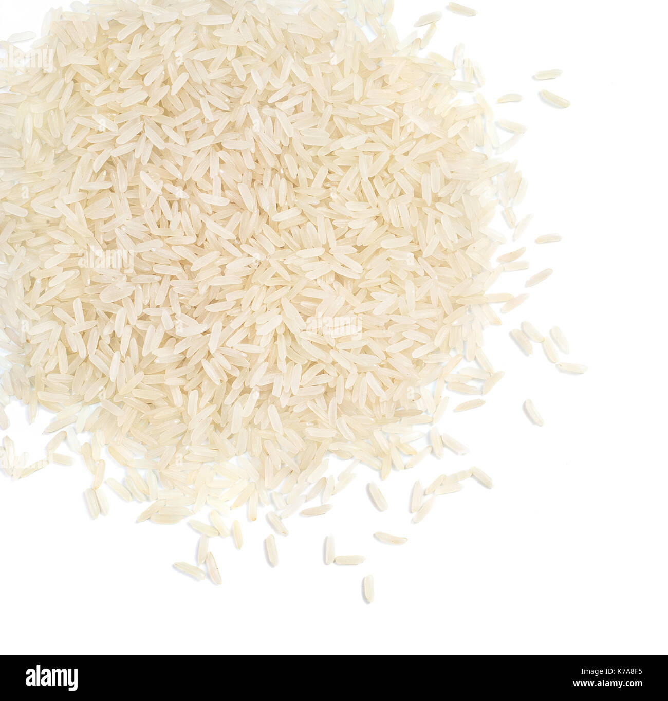 Healthy food. Close up of heap of parboiled rice on white background ...