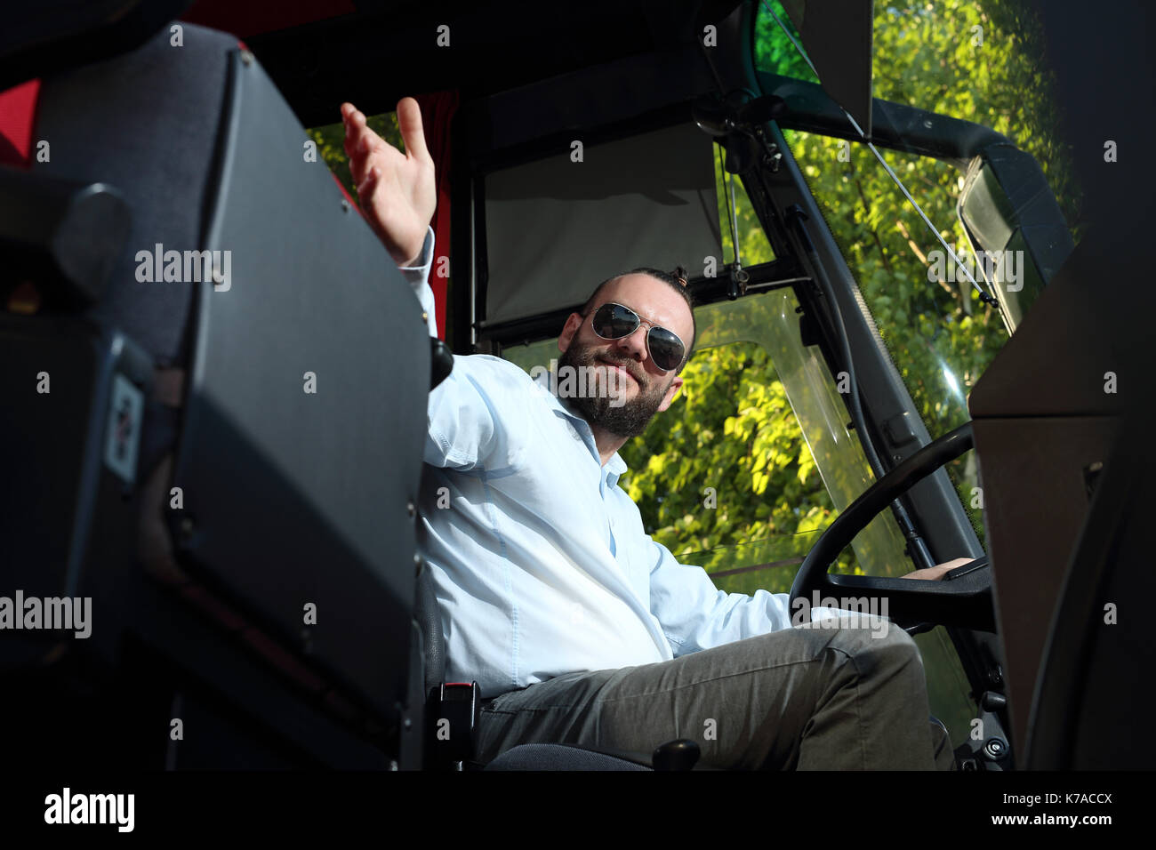 Bus driver. A handsome bus driver in the bus Stock Photo - Alamy