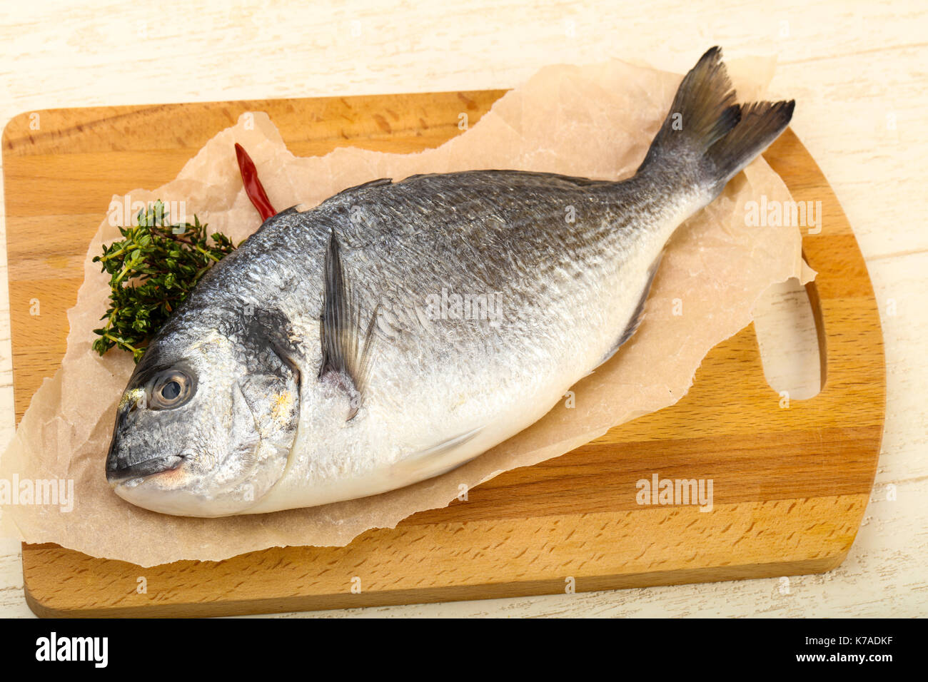 raw dorada fish - ready for cooking Stock Photo - Alamy