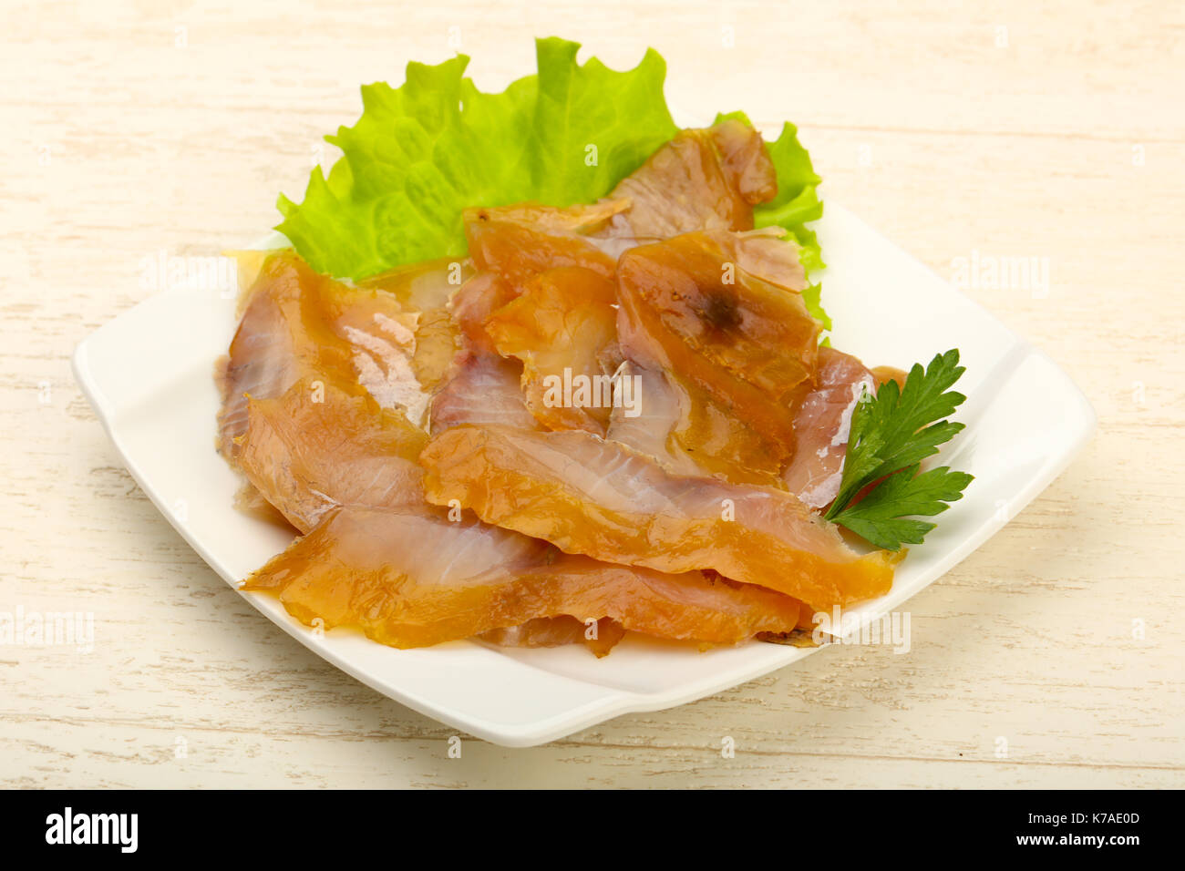Smoked catfish fillet carpaccio Stock Photo - Alamy