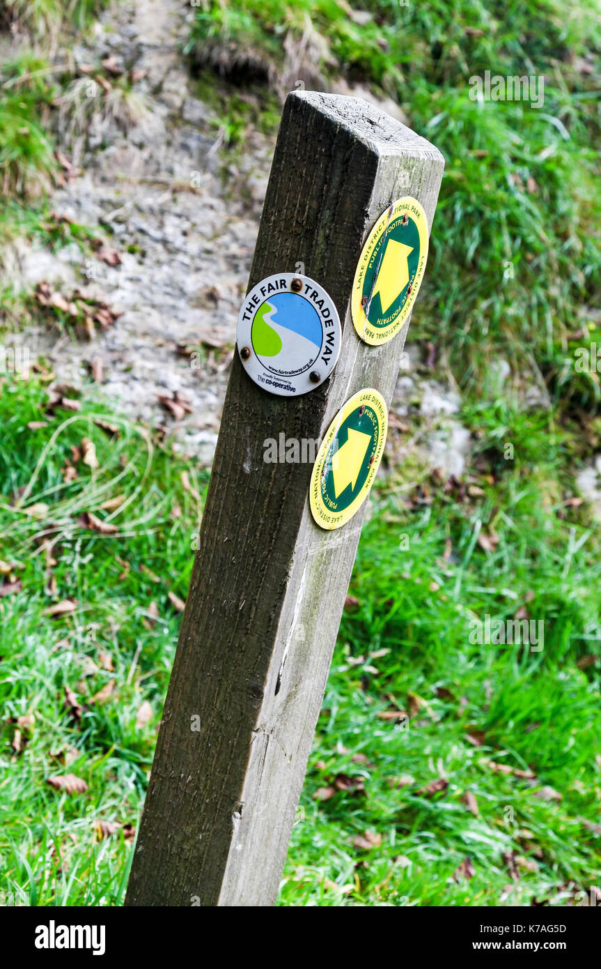 A wooden footpath way marker for The Fair Trade Way, English Lake ...