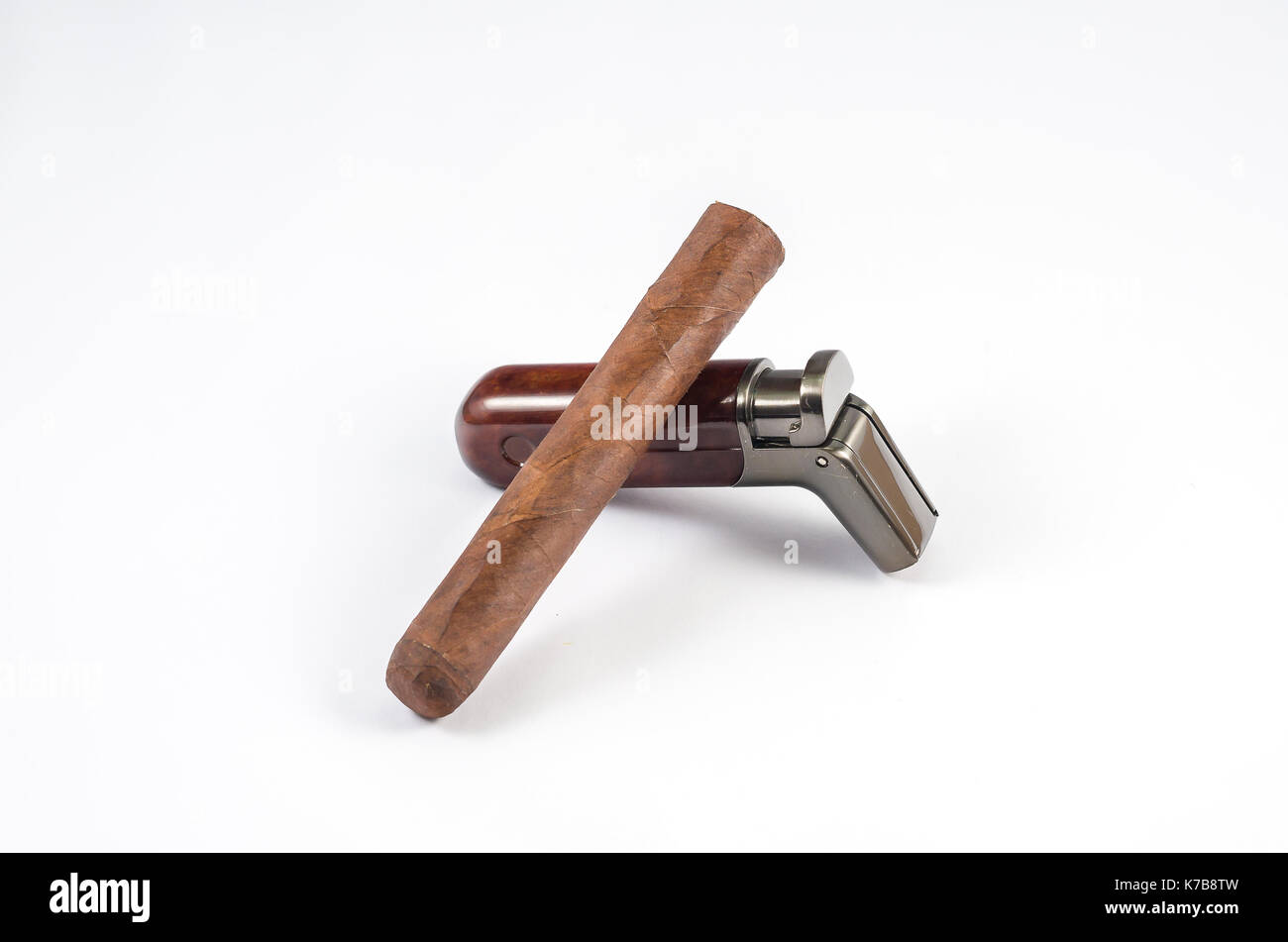 Cuban cigar with lighter on white background, Cuban culture, elegance ...