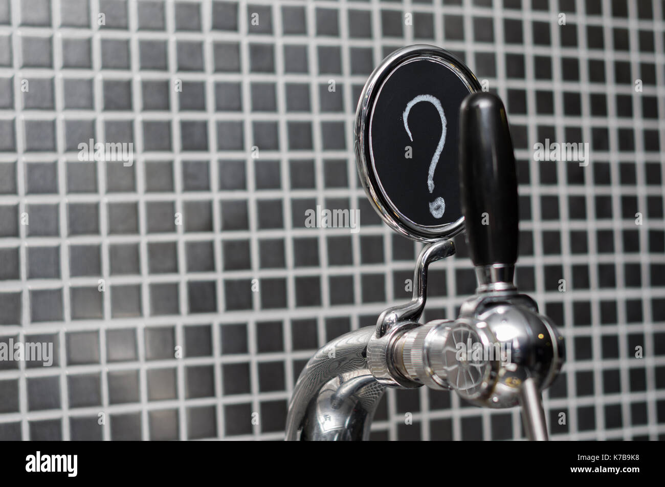 Beer tap with medallion with question mark as description Stock Photo ...