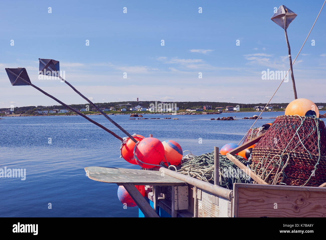 Lobster pots, nets and buoys on fishing trawler, Newfoundland, Canada ...