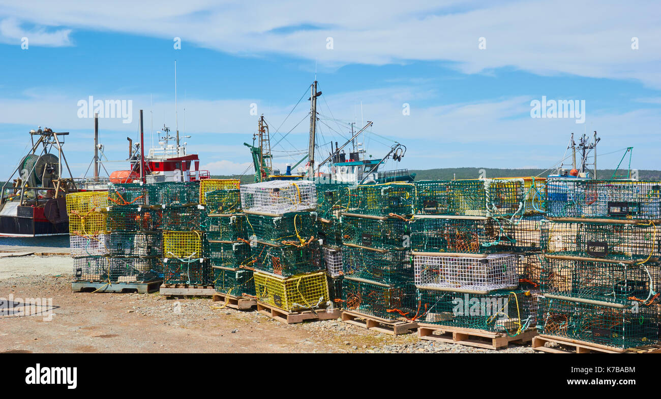Lobster pots on quay, Port au Choix, Newfoundland, Canada Stock Photo ...