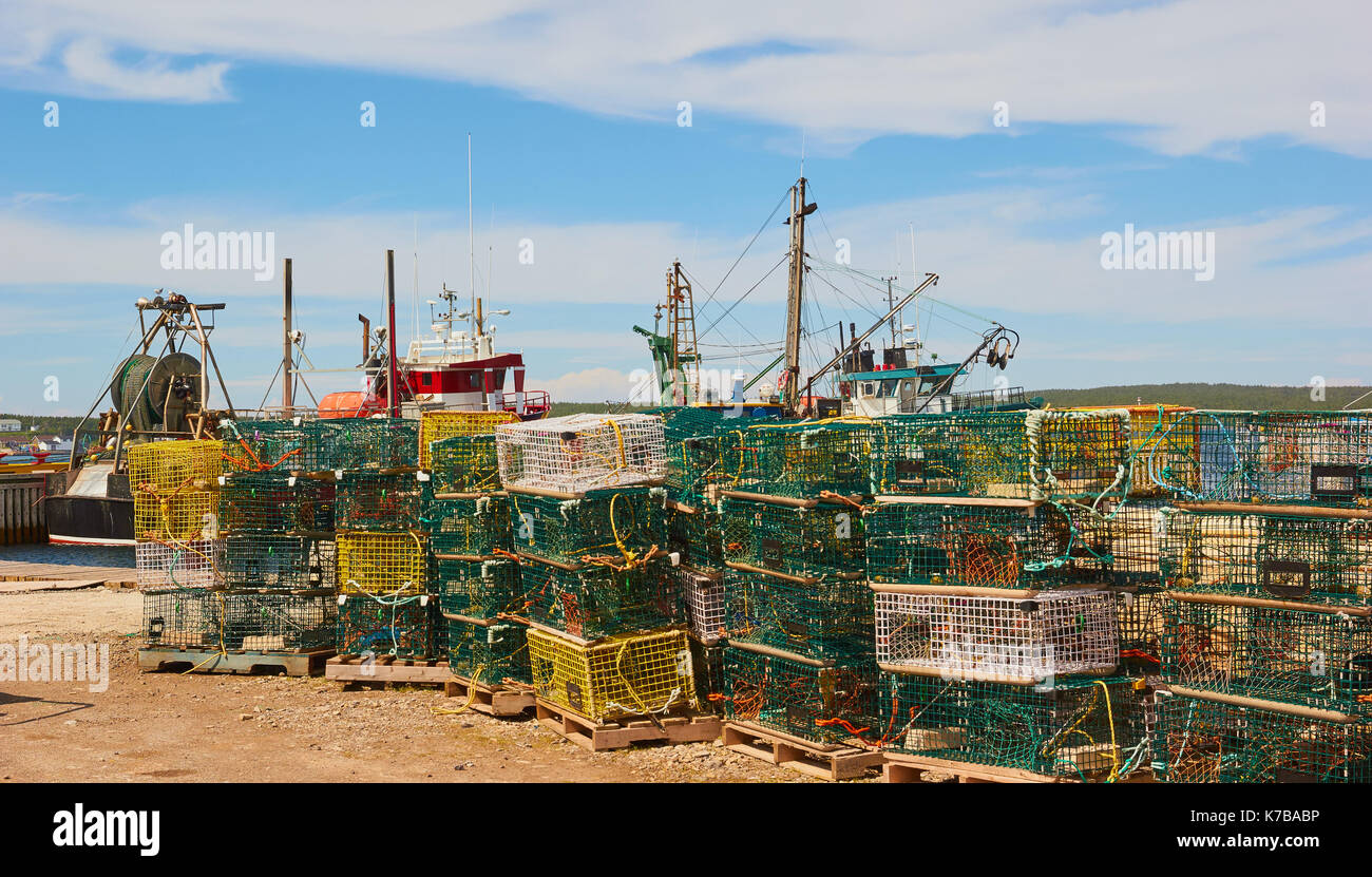 Lobster pots on quay, Port au Choix, Newfoundland, Canada Stock Photo ...