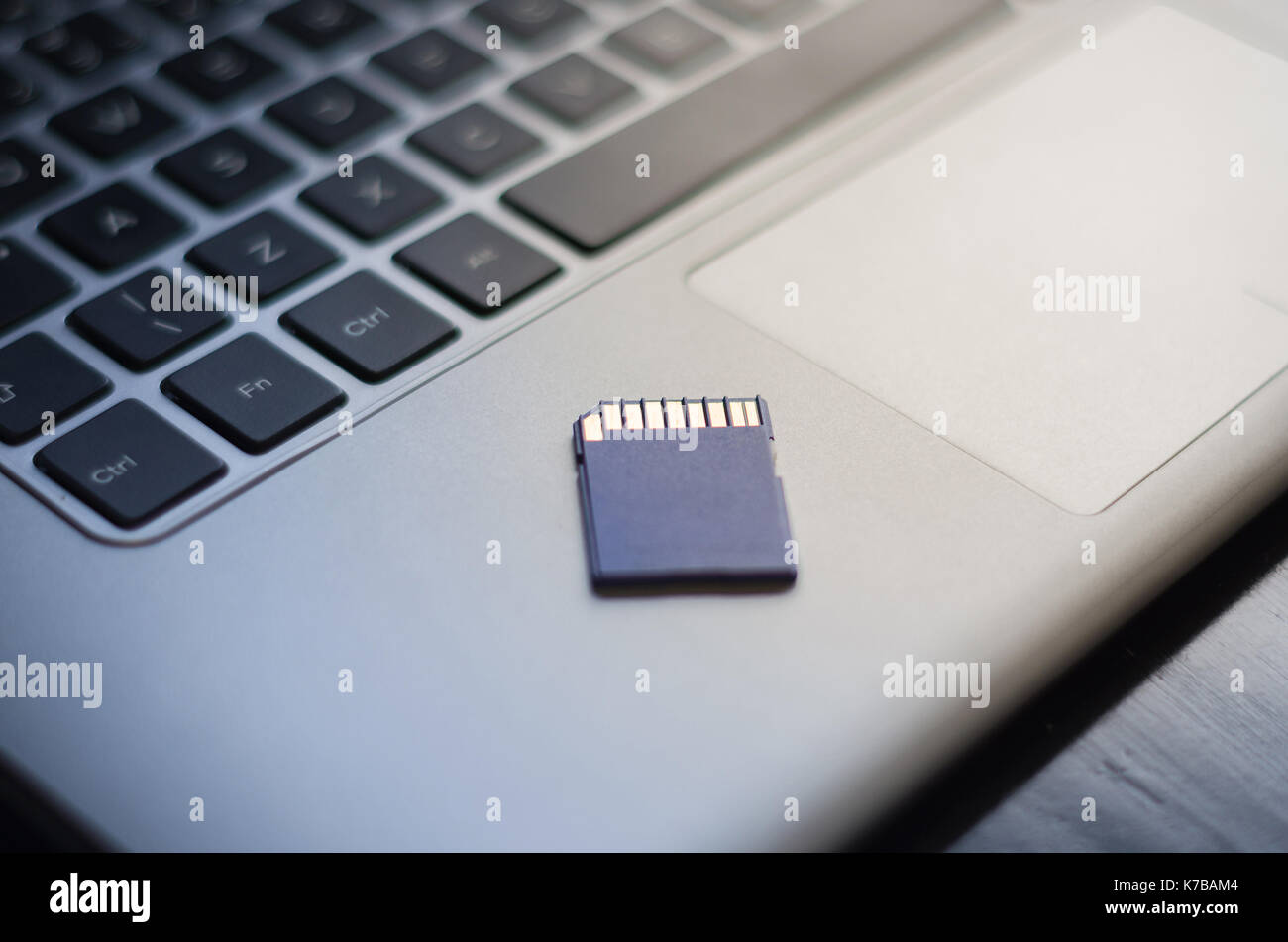 SD memory card on top of computer Stock Photo - Alamy