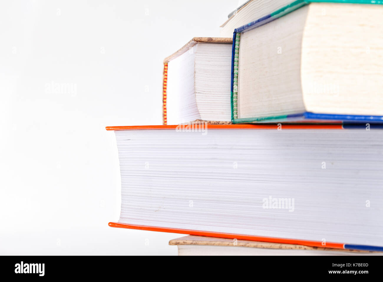 Several old books on white background Stock Photo - Alamy