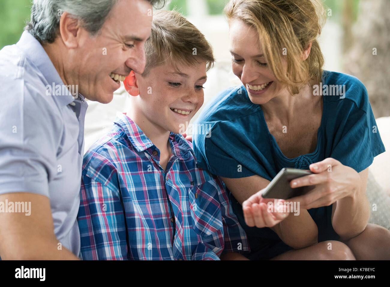 Parents using smart hi-res stock photography and images - Alamy