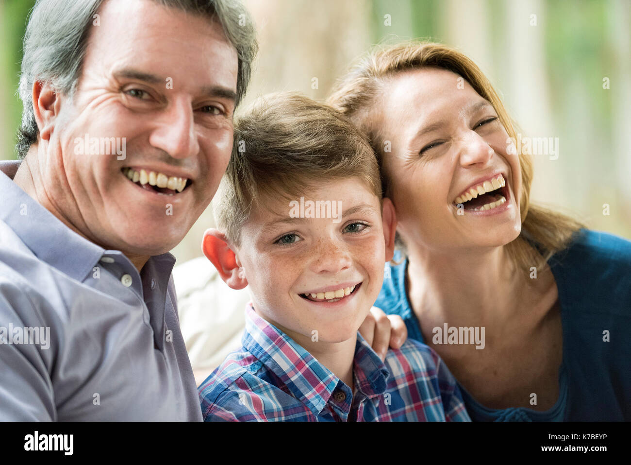Family smiling together, portrait Stock Photo - Alamy