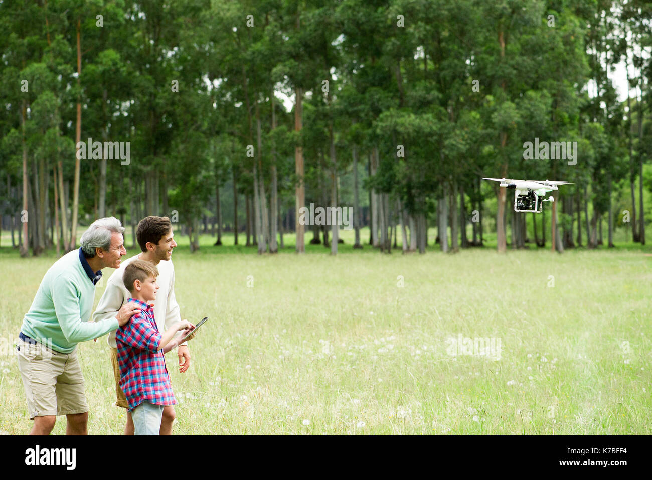Grandfather father son in park hi-res stock photography and images - Alamy