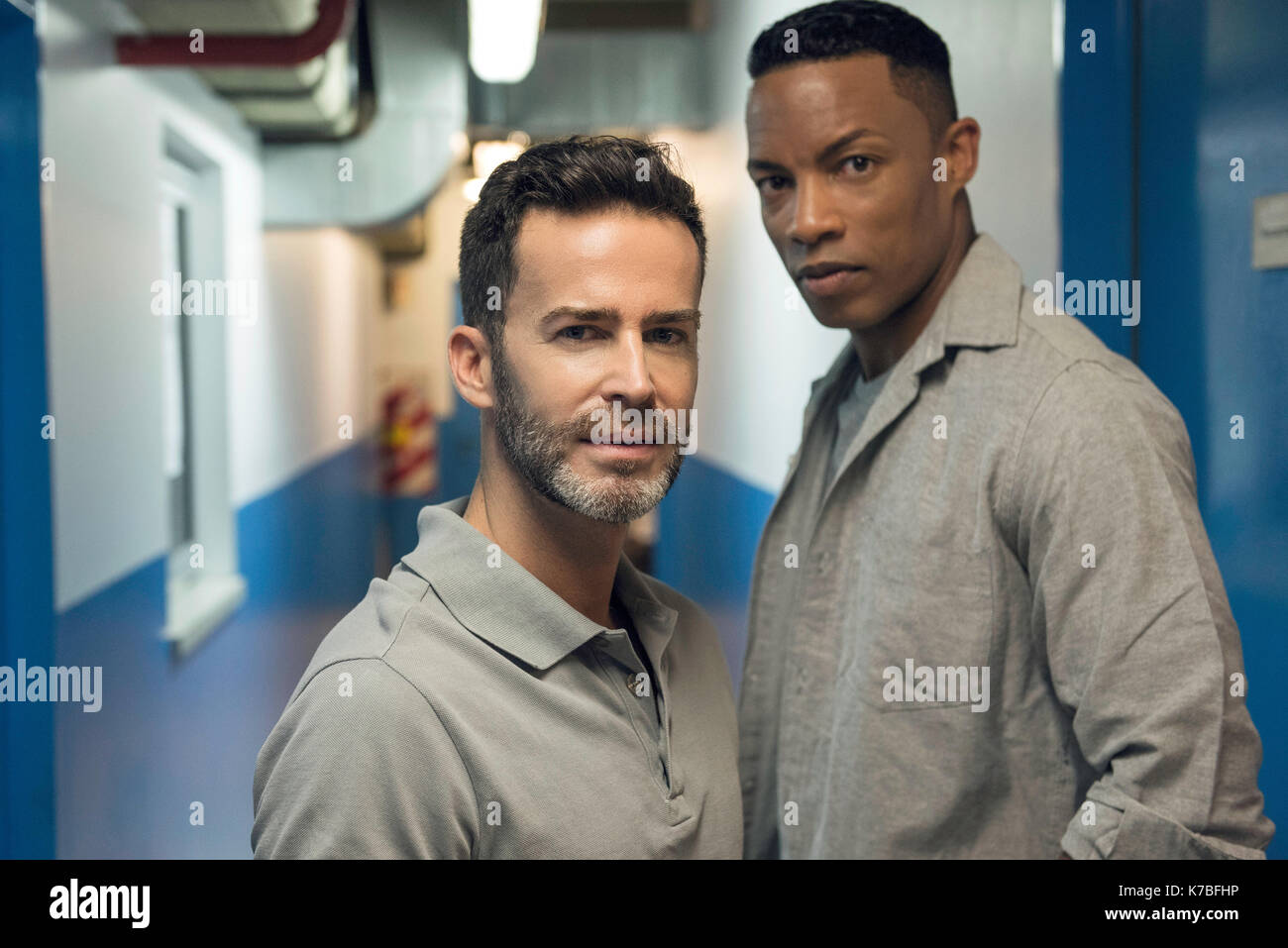 Two men standing together hi-res stock photography and images - Alamy