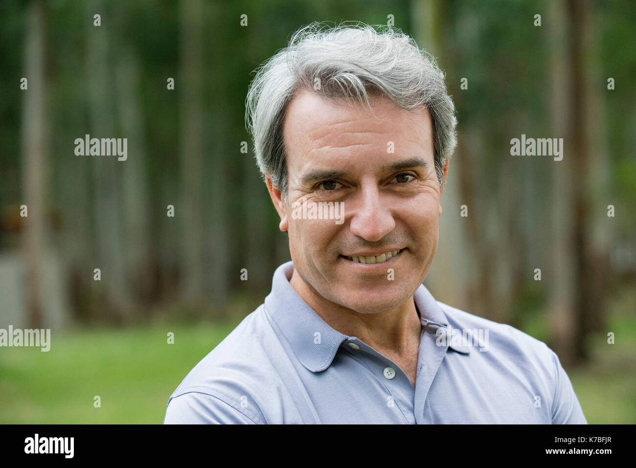Mature man smiling, portrait Stock Photo - Alamy