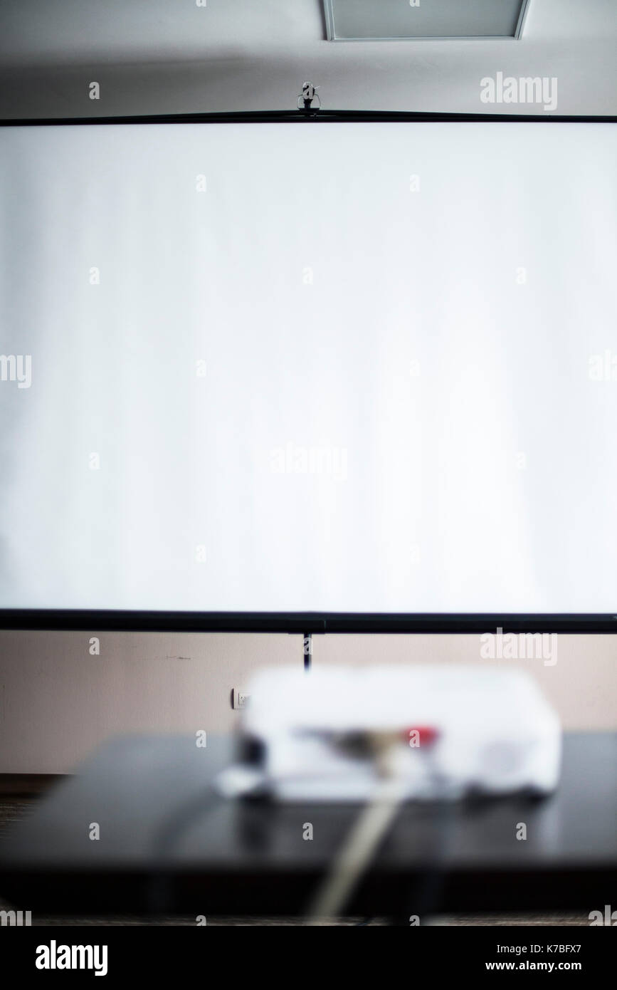 Blank projection screen in office or classroom Stock Photo - Alamy