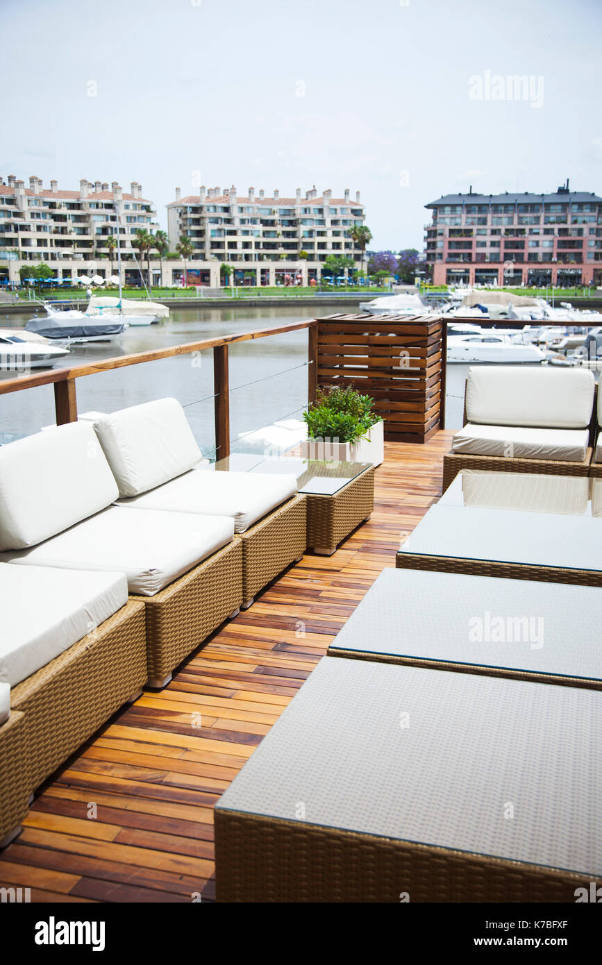 Deck overlooking marina at luxury hotel Stock Photo - Alamy