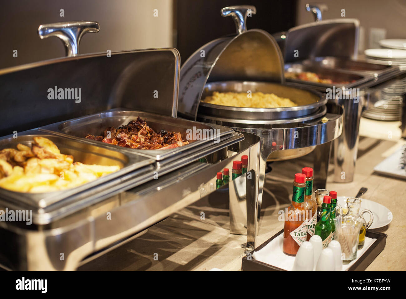 Prepared food in warming dishes on buffet Stock Photo - Alamy