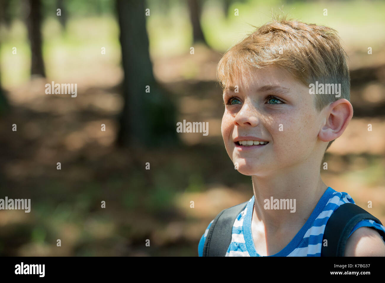 Boy smiling outdoors Stock Photo - Alamy