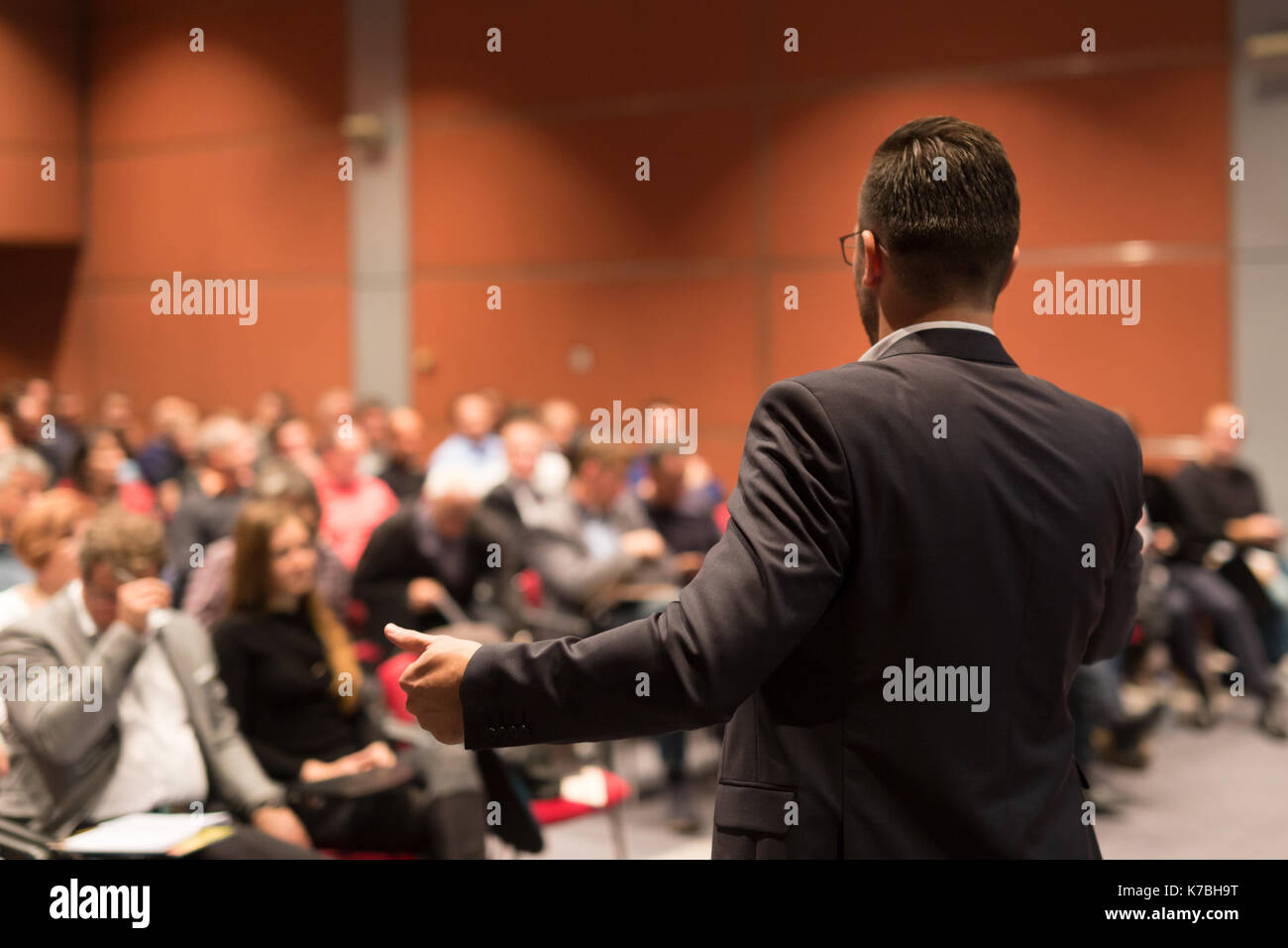 Public speaker giving talk at Business Event Stock Photo - Alamy