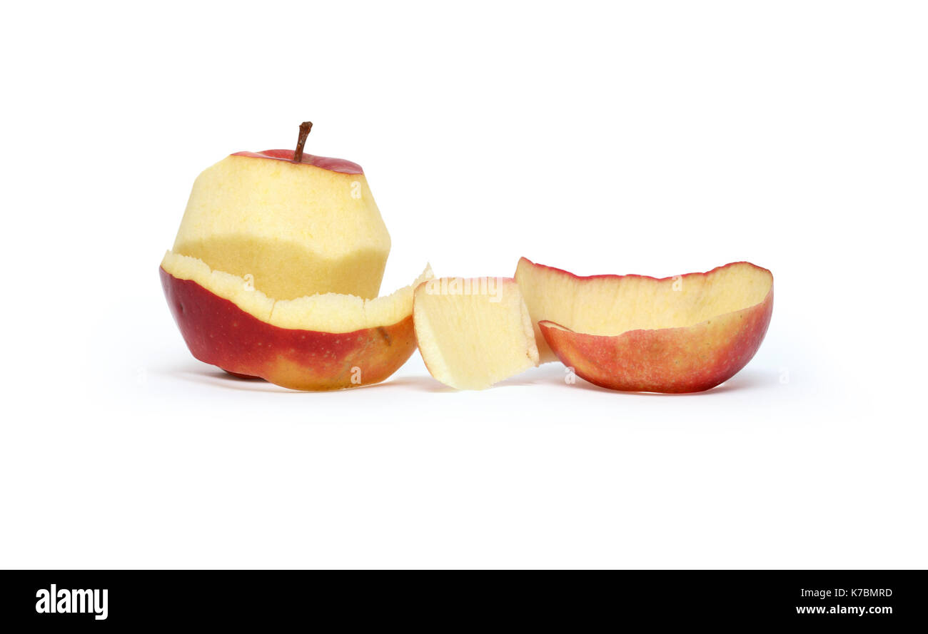 Apple peeled with twisting skin against white background. Clipping path ...