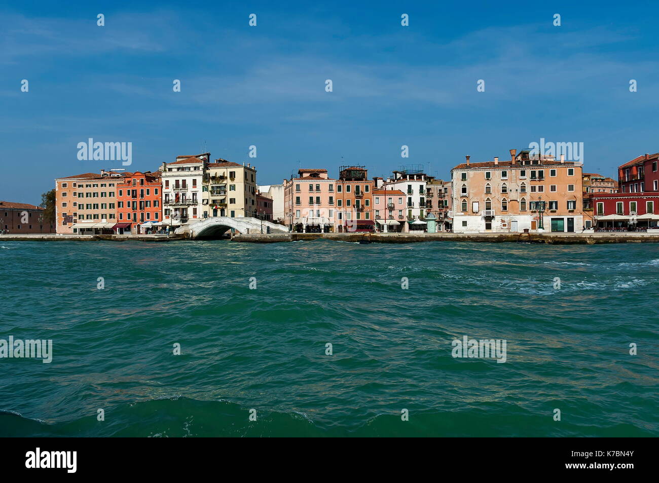 View from the sea at the residential district of waterside with bridge ...