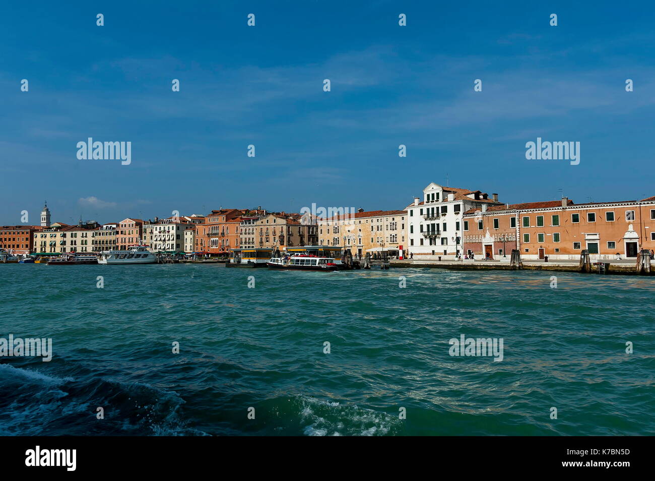 View from the sea at the residential district of waterside with port in ...
