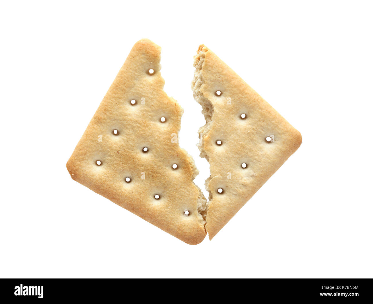 Cracker cracked half-and-half on white background. Isolated with ...