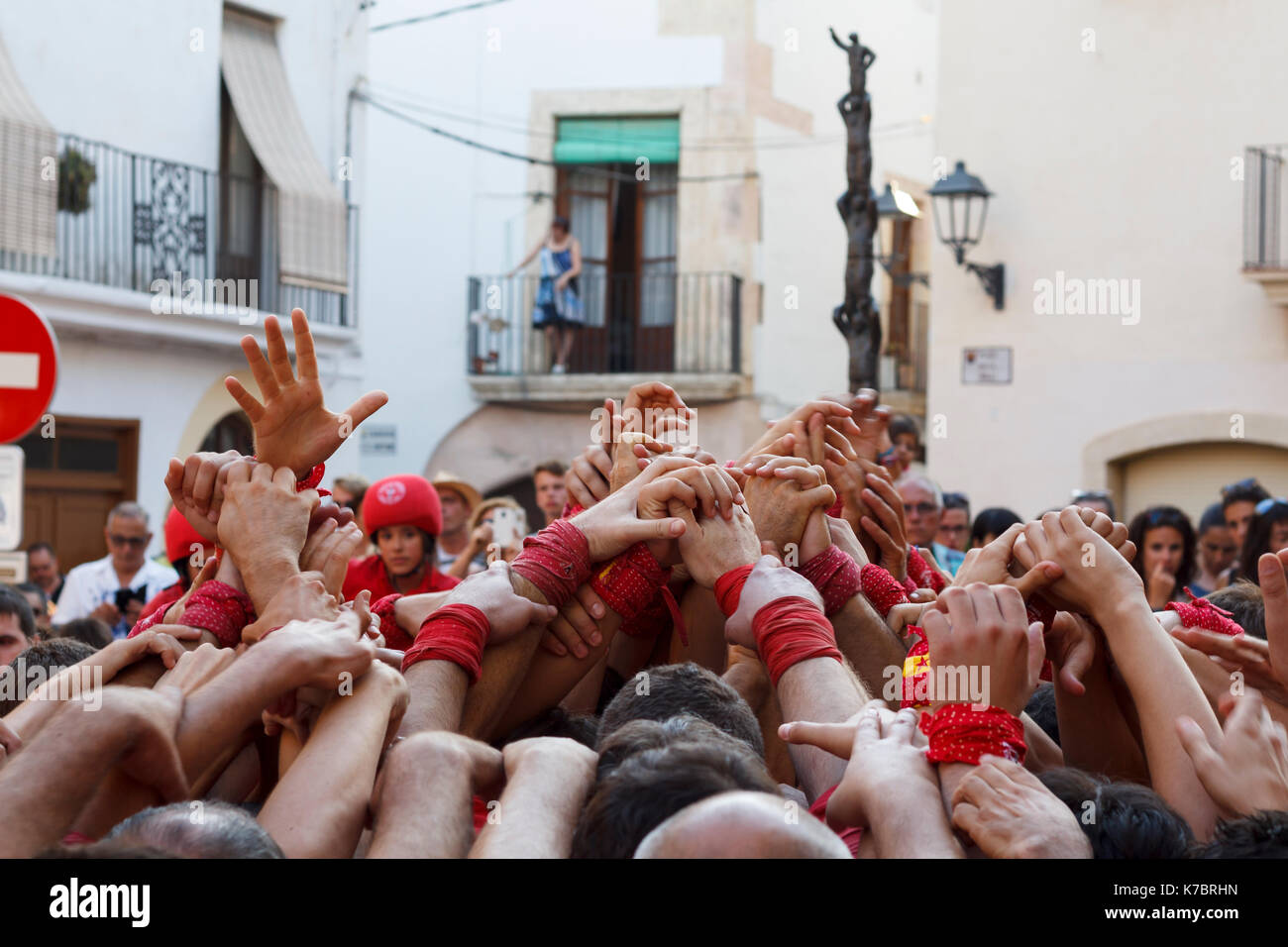 People making human towers, a traditional spectacle in Catalonia called ...