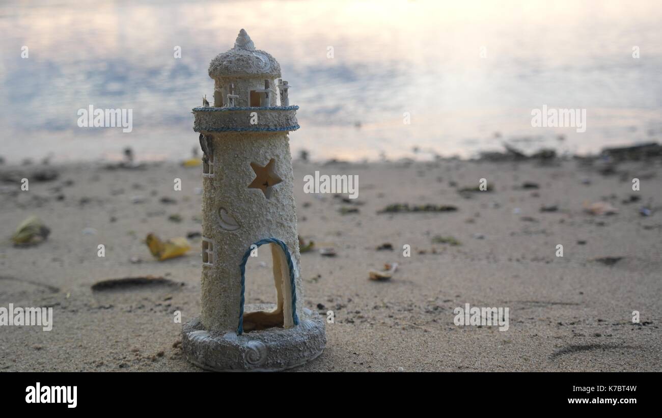 Lighthouse on the Beach Stock Photo - Alamy