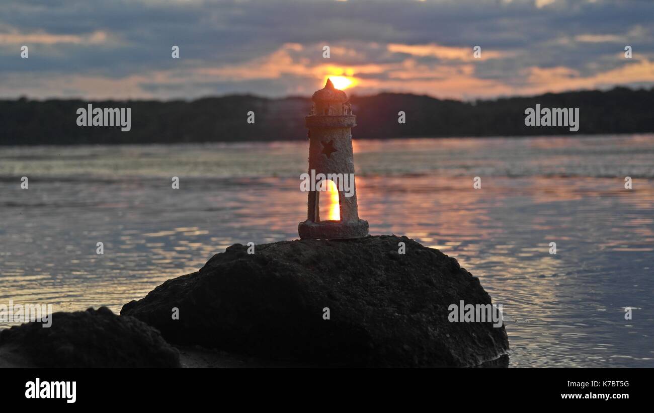 Lighthouse on the Beach Stock Photo - Alamy