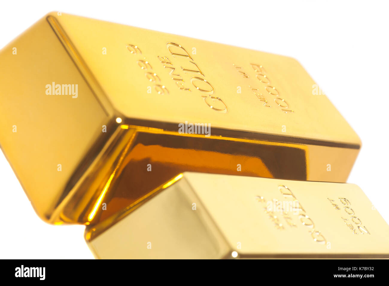 Gold bars isolated on white background Stock Photo - Alamy